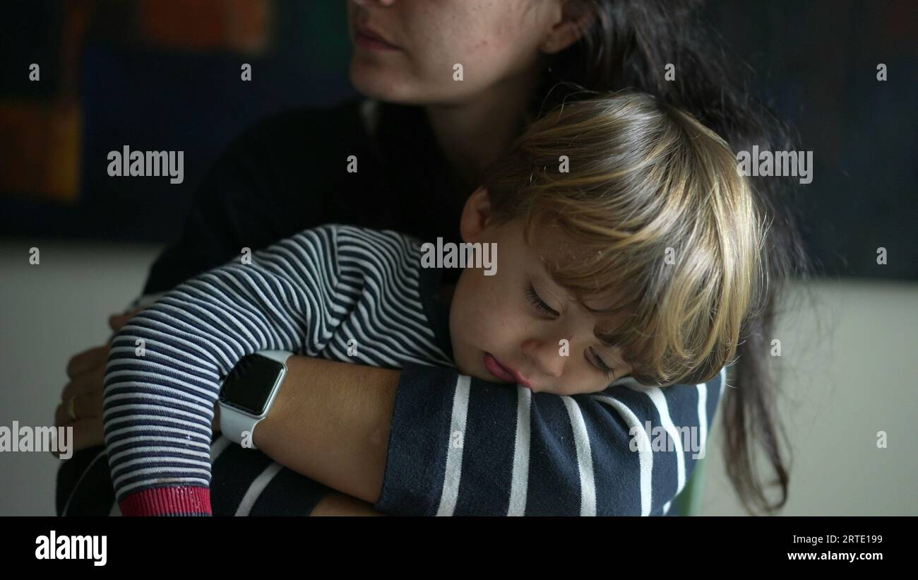 Heart-warming scene of mother embracing child, authentic motherhood ...