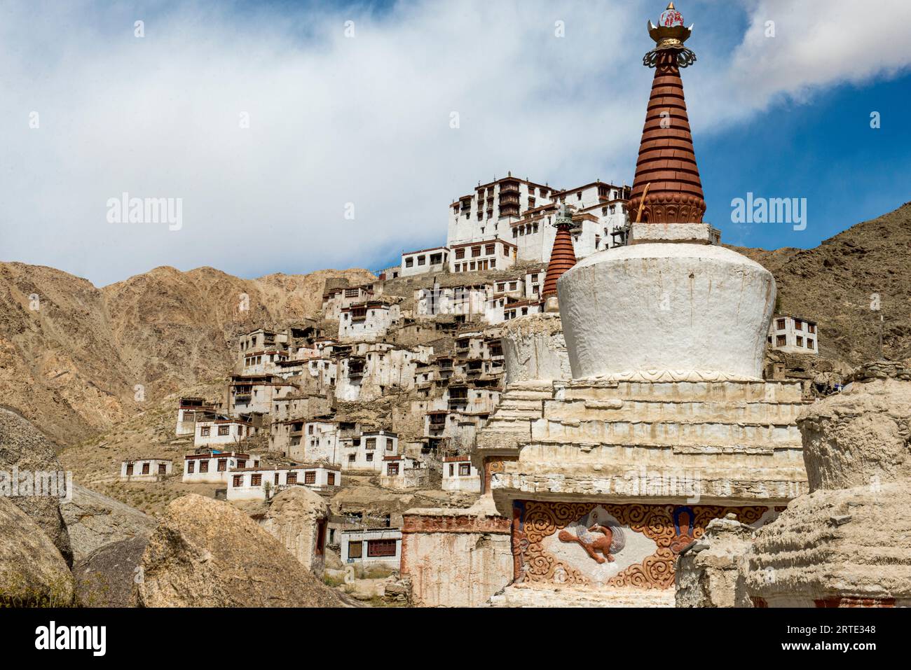 Close-up of Stupas with mountainside building complex of the Tibetan ...