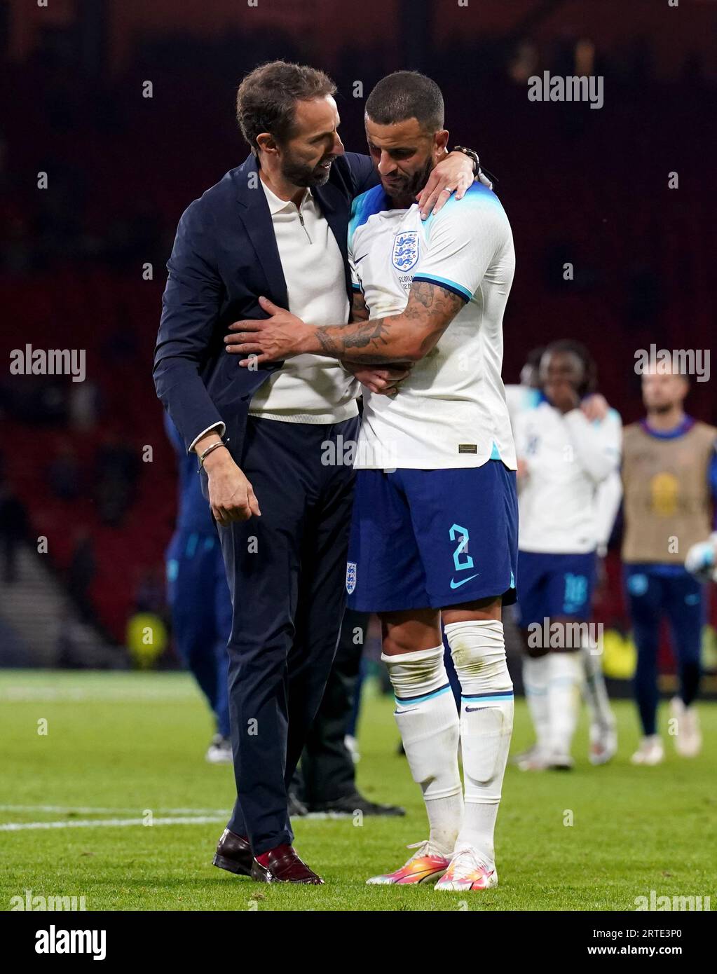 England manager Gareth Southgate speaks with Kyle Walker following the ...