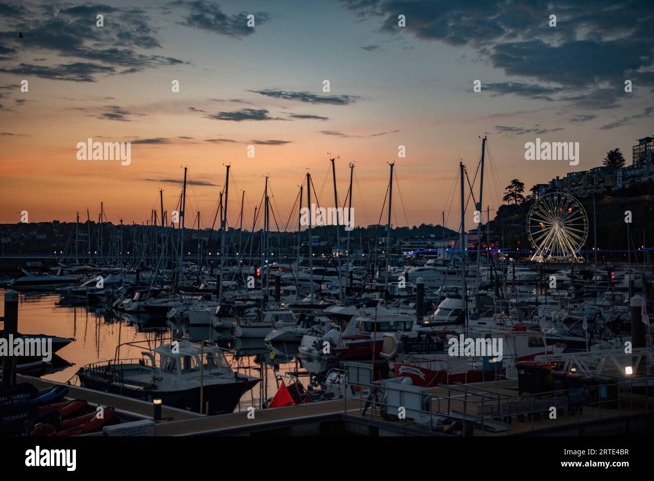 Sunset in September at Torquay Harbour, Torbay. Lots of boats in the ...