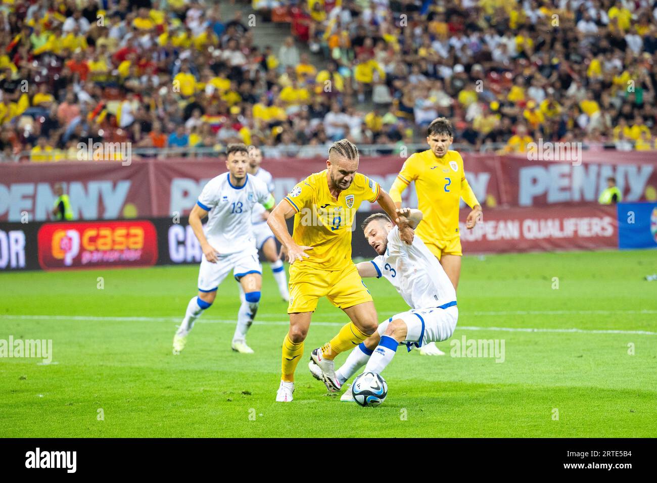 George Puscas of Romania and Fidan Aliti of Kosovo during the UEFA Euro ...