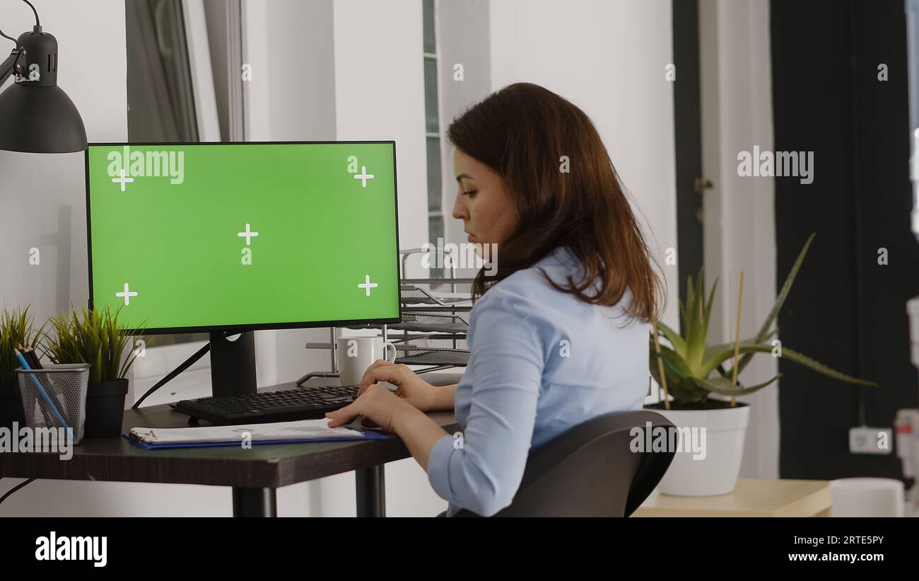 Office worker analyzing greenscreen template hi-res stock photography ...