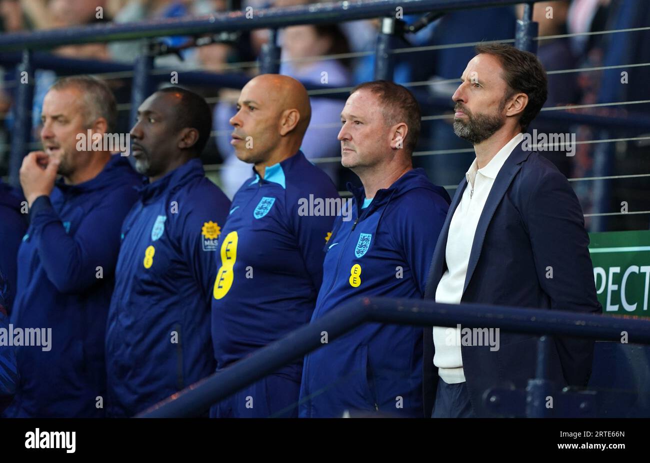 England head coach Gareth Southgate (right) with his coaching staff ...