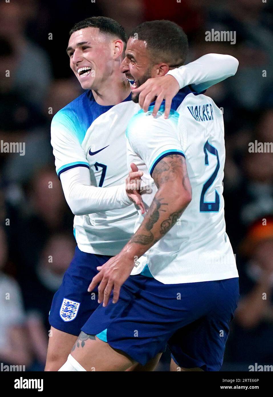 England’s Phil Foden celebrates scoring the opening goal with team mate ...
