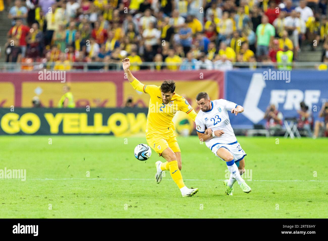 Andrei Ratiu of Romania and Bernard Berisha of Kosovo during the UEFA ...