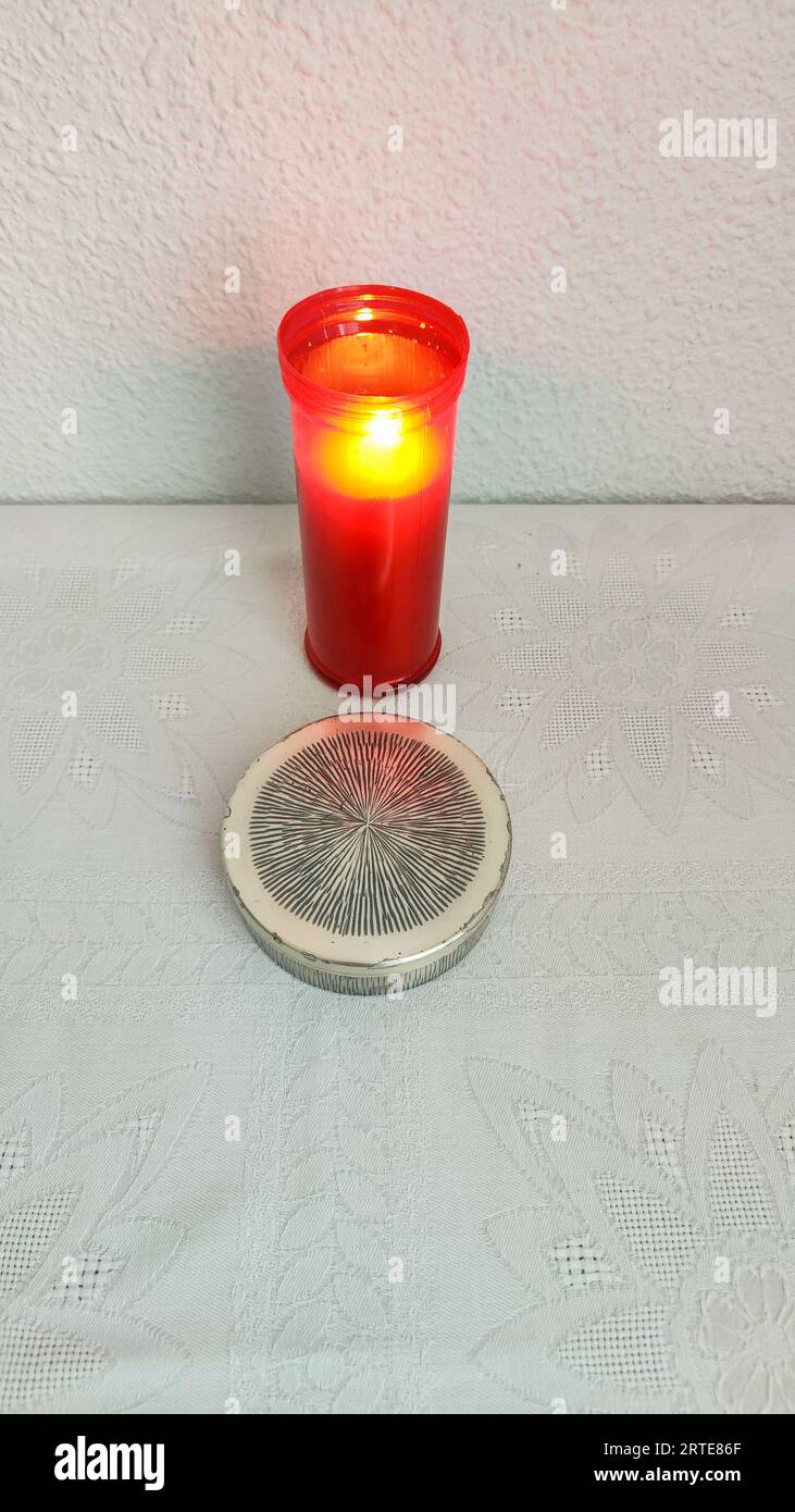 lighted candle for the reserved of the Most Holy body of Christ with ...
