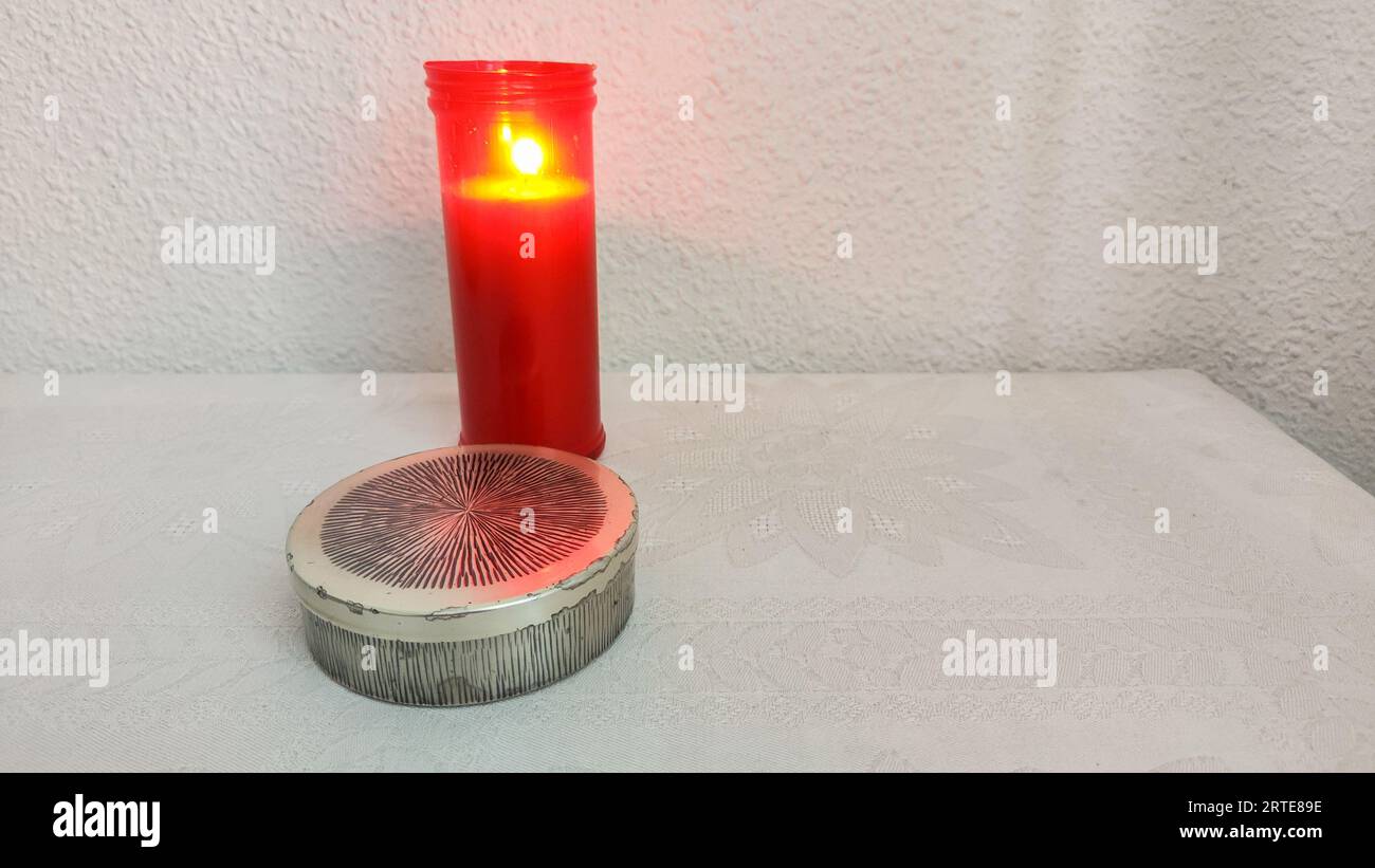 lighted candle for the reserved of the Most Holy body of Christ with ...