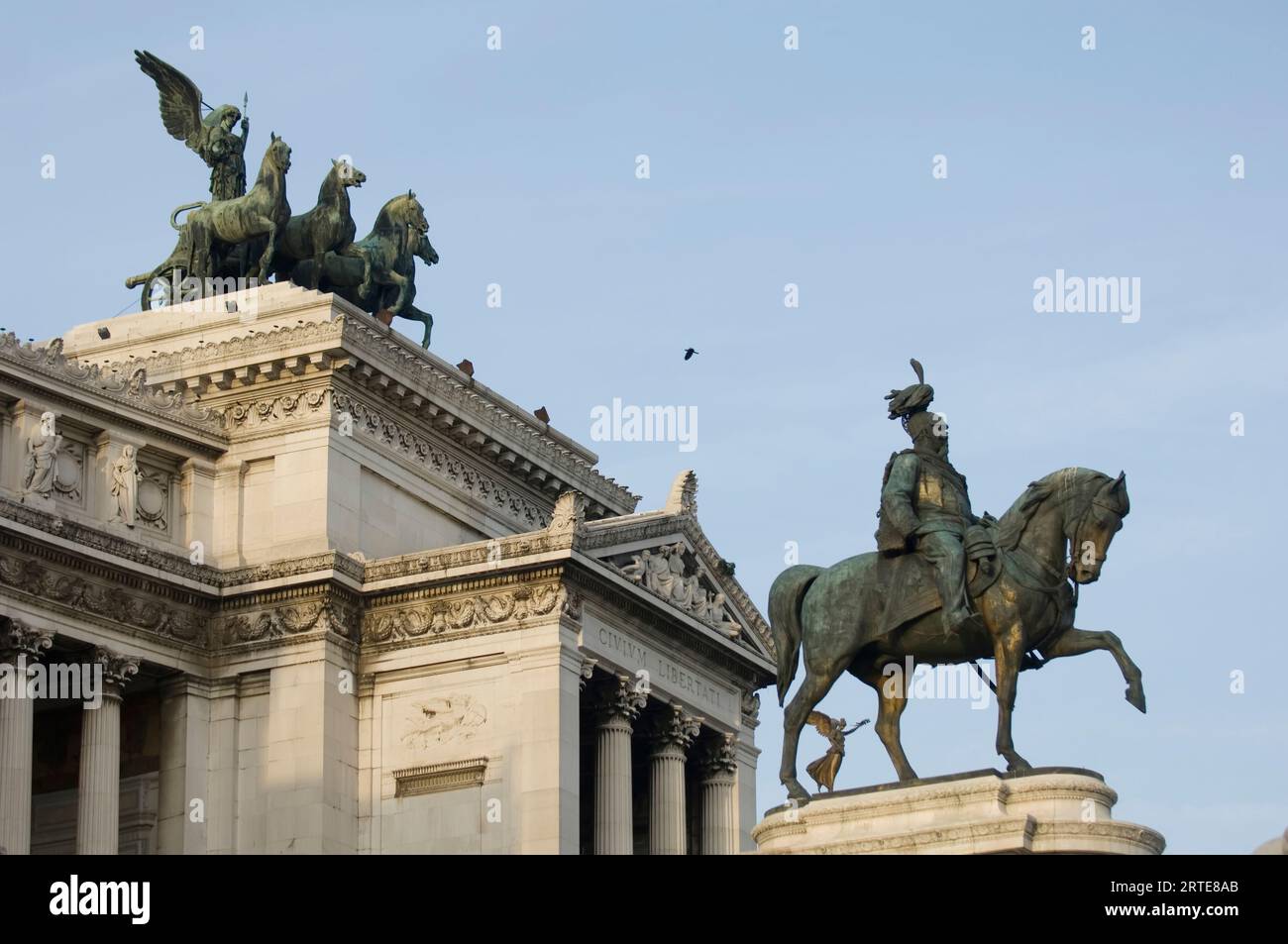 Statues sit atop the Corinthian columns of ancient Rome; Rome, Lazio ...