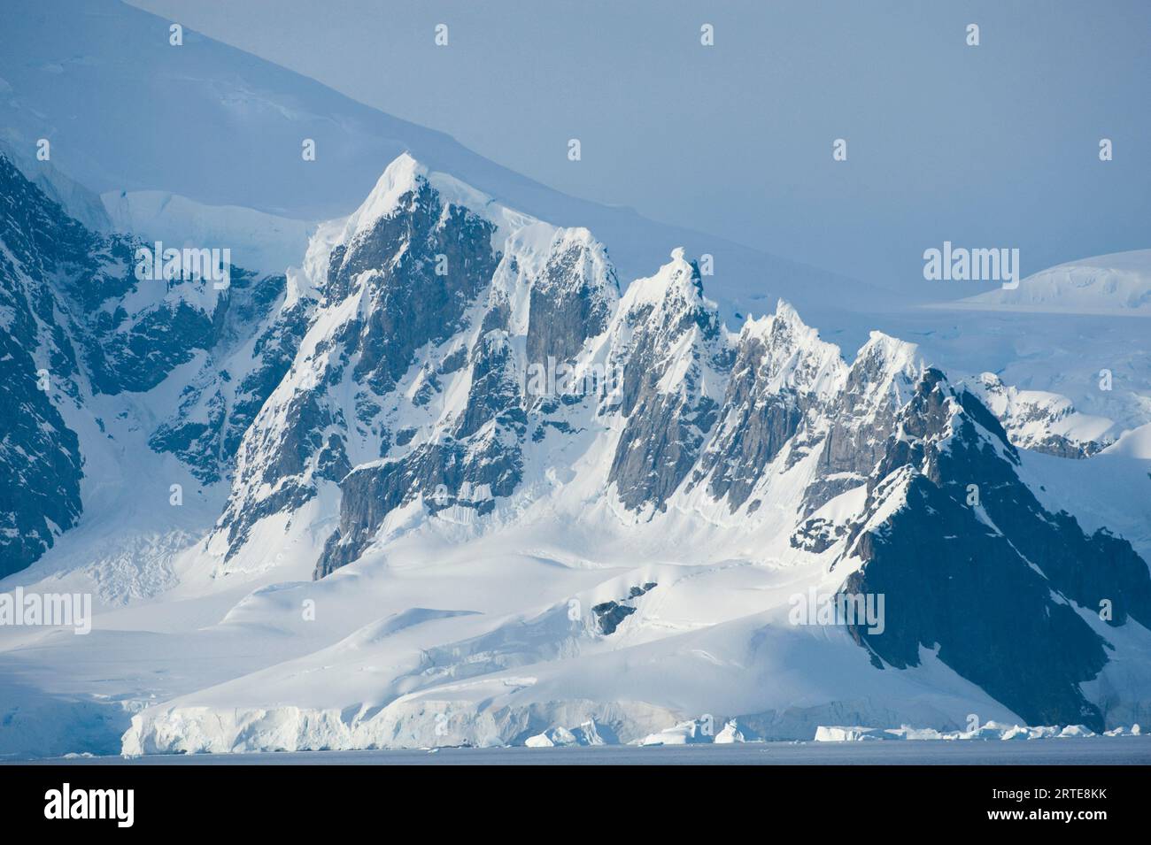 Rugged snowy mountains of Antarctica's Gerlache Strait; Antarctica ...