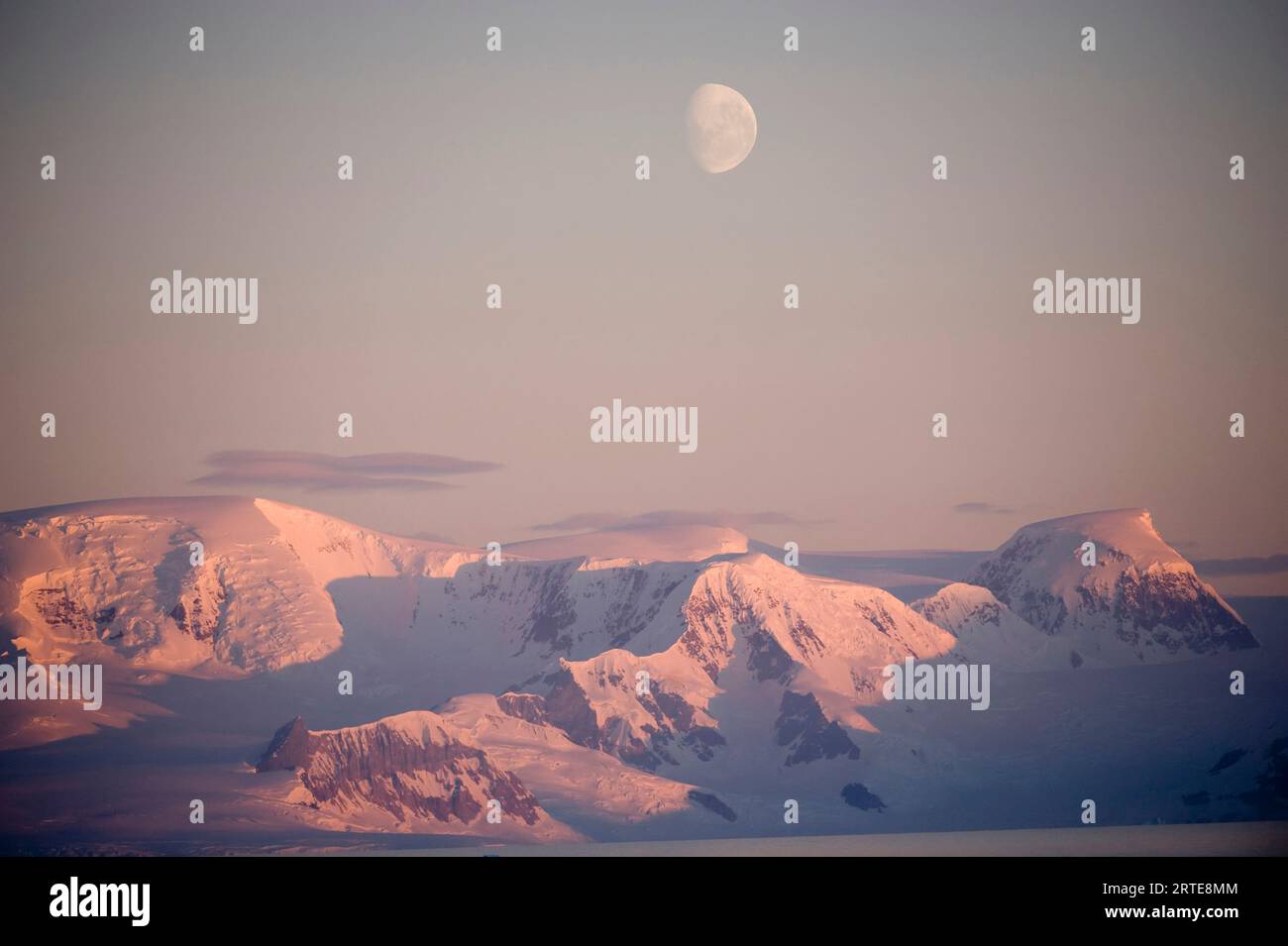 The moon above the Antarctic Peninsula, near the Antarctic Circle ...