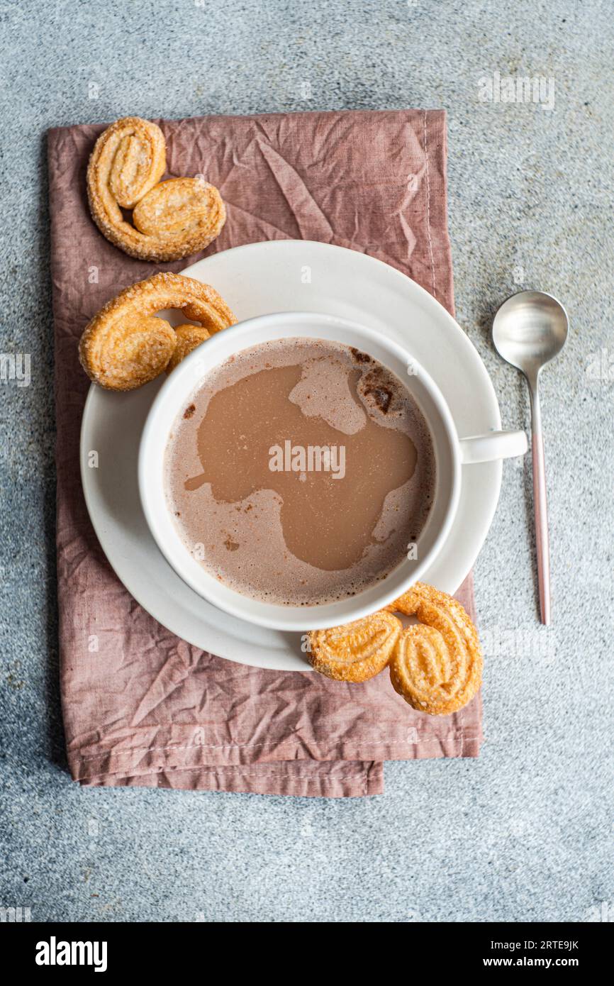 Cup of latte with pig's trotters Stock Photo - Alamy