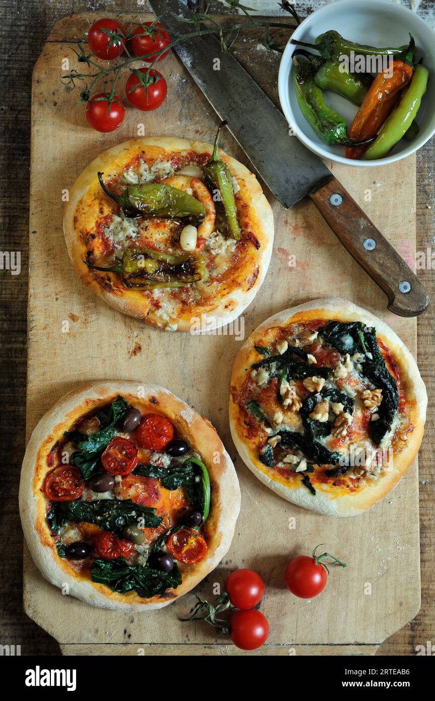 Small pizzas with vegetables Stock Photo - Alamy