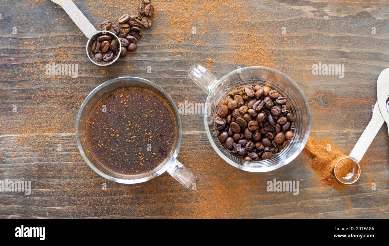 Coffee beans on spoons hi-res stock photography and images - Alamy