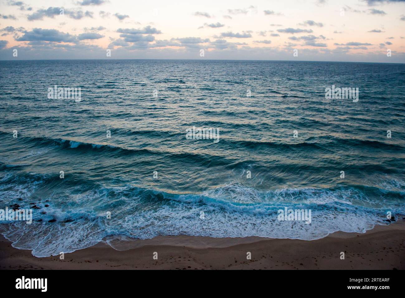 Beautiful beach high tide in hi-res stock photography and images - Alamy