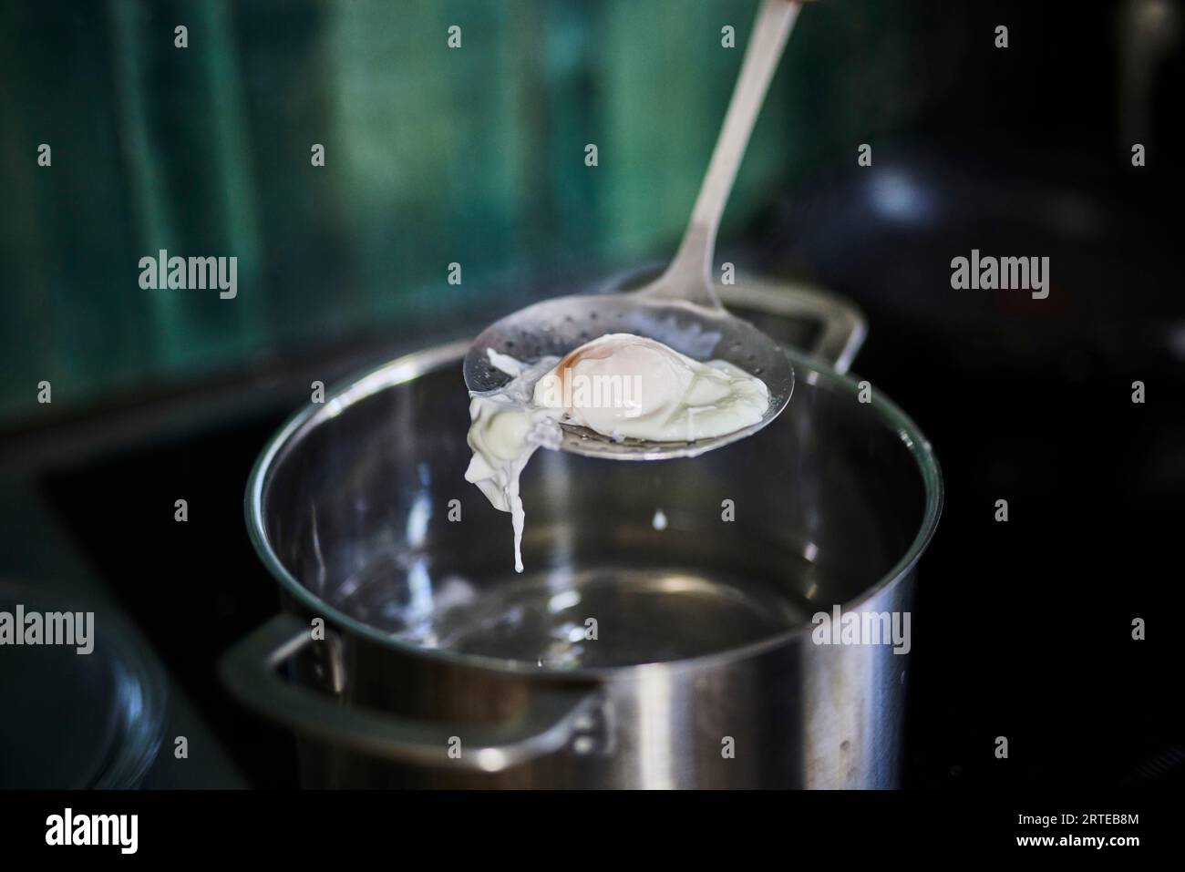 Lifting water pot hi-res stock photography and images - Alamy