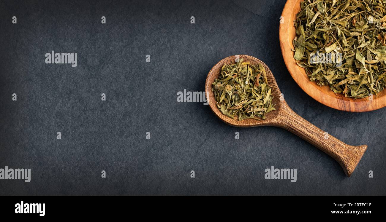 Dehydrated rue leaves in the bowl - Ruta graveolens Stock Photo - Alamy