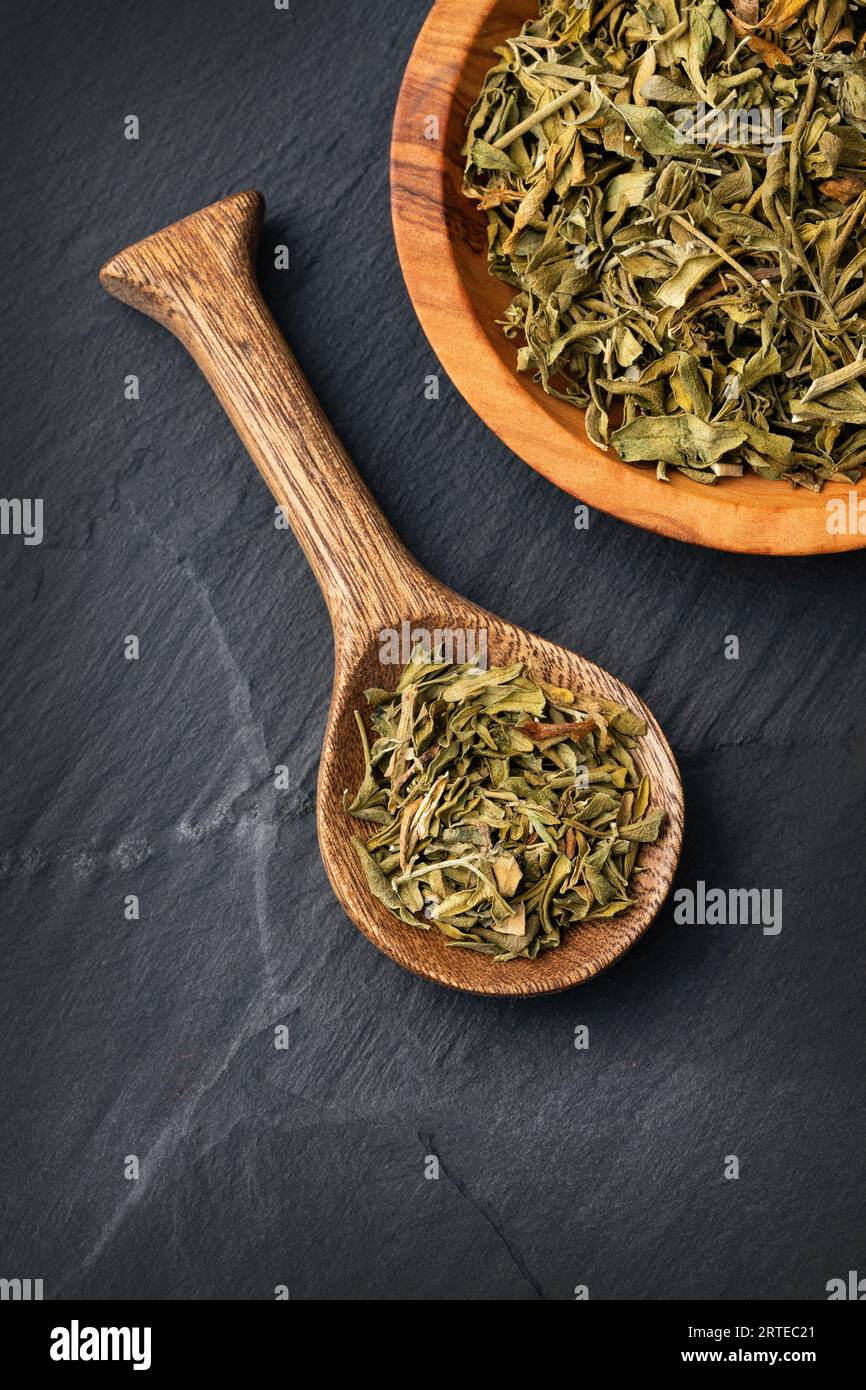 Ruta graveolens - Dried rue leaves in the spoon Stock Photo - Alamy