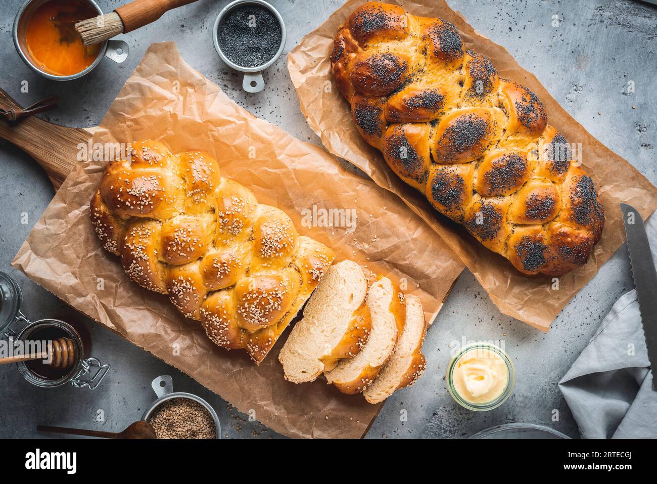Challah (Jewish yeast plait with poppy seeds and sesame for Sabbath ...