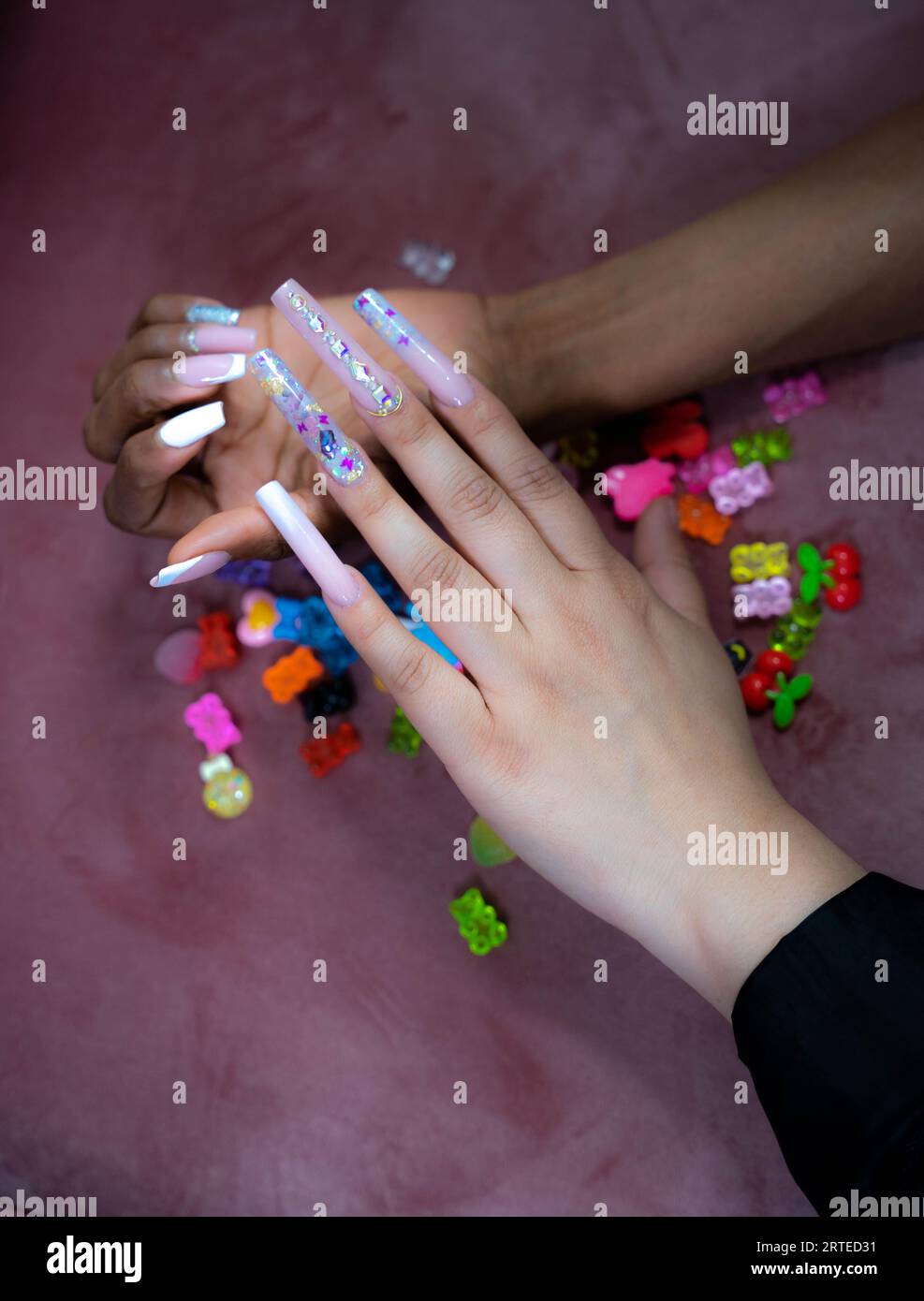 Gummy bears hands hi-res stock photography and images - Alamy