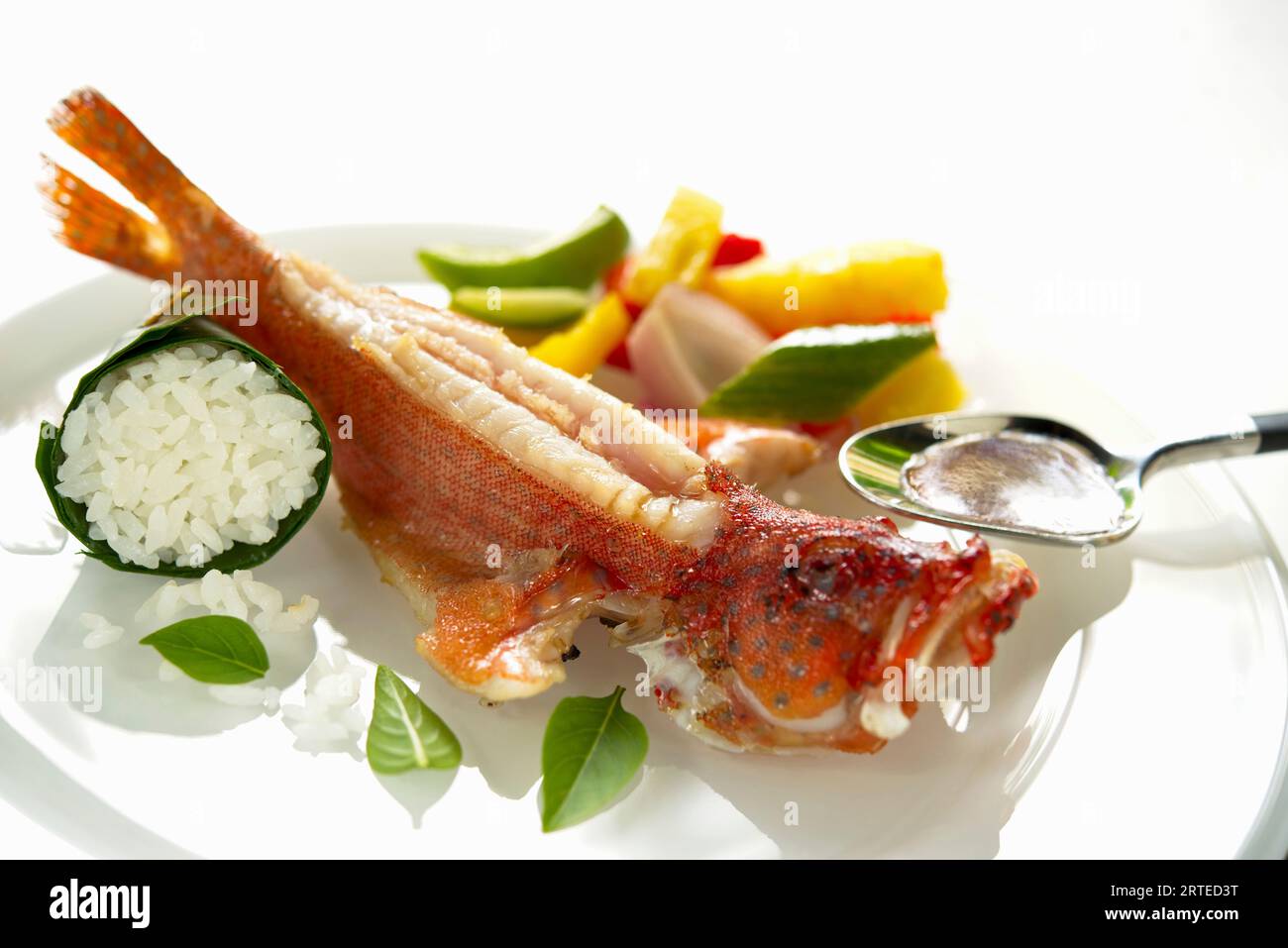Fish sweet and sour with vegetables and rice (Hong Kong Stock Photo - Alamy