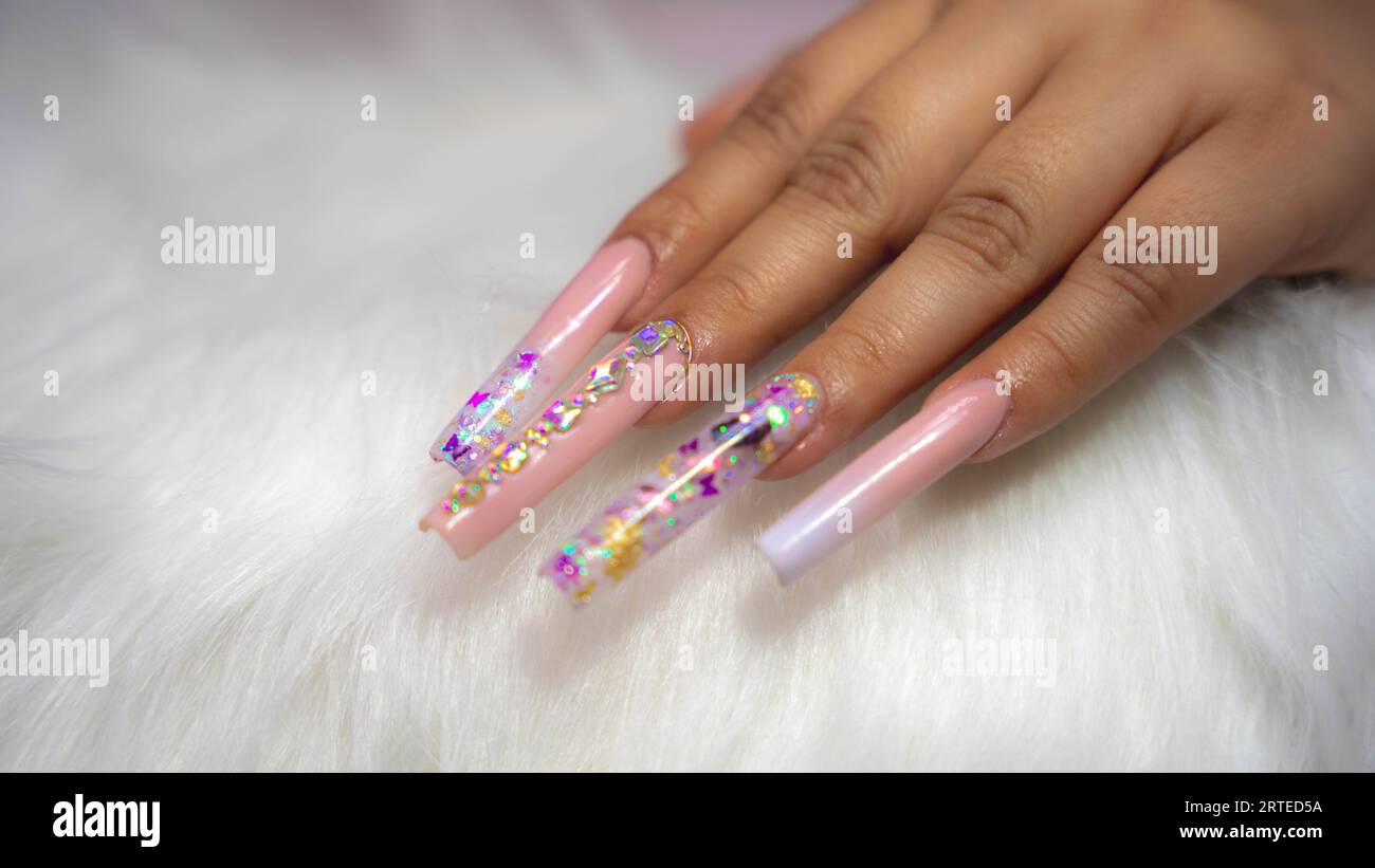 hand with long nails Stock Photo - Alamy