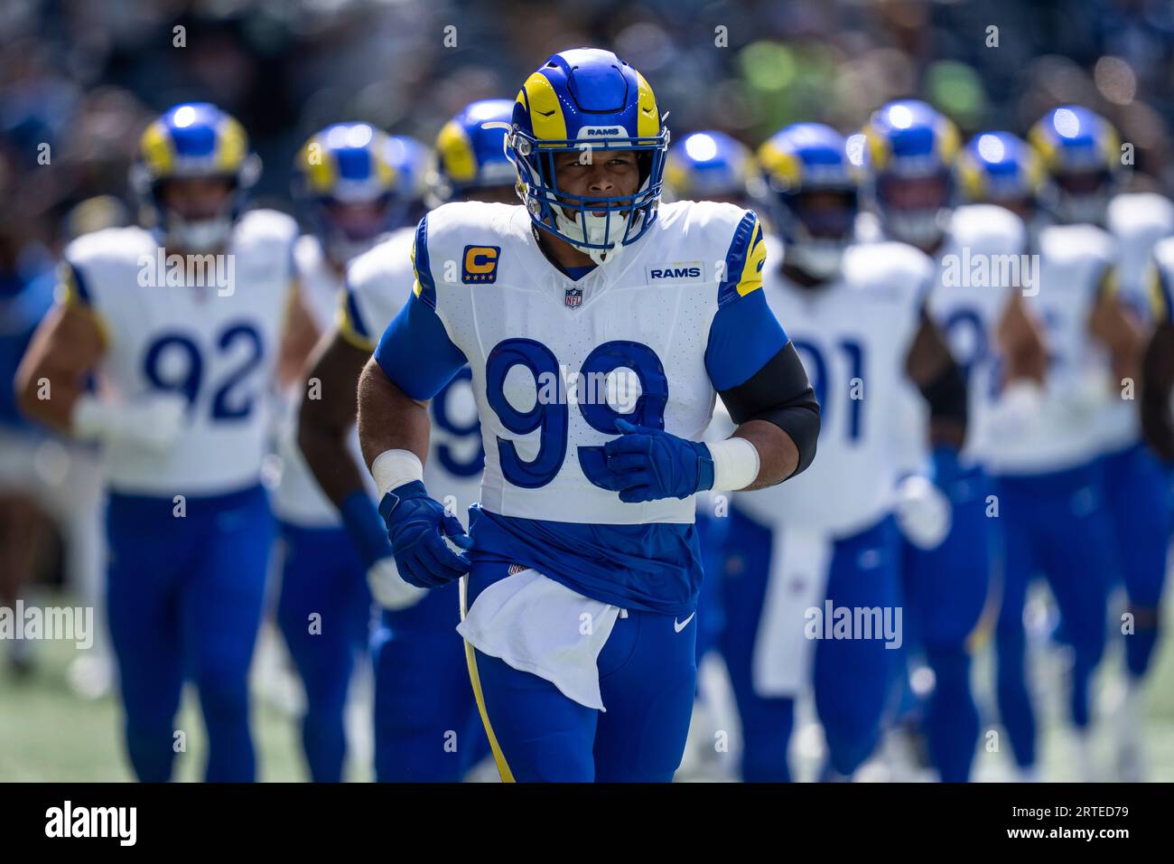 Los Angeles Rams defensive lineman Aaron Donald jogs on to the field ...