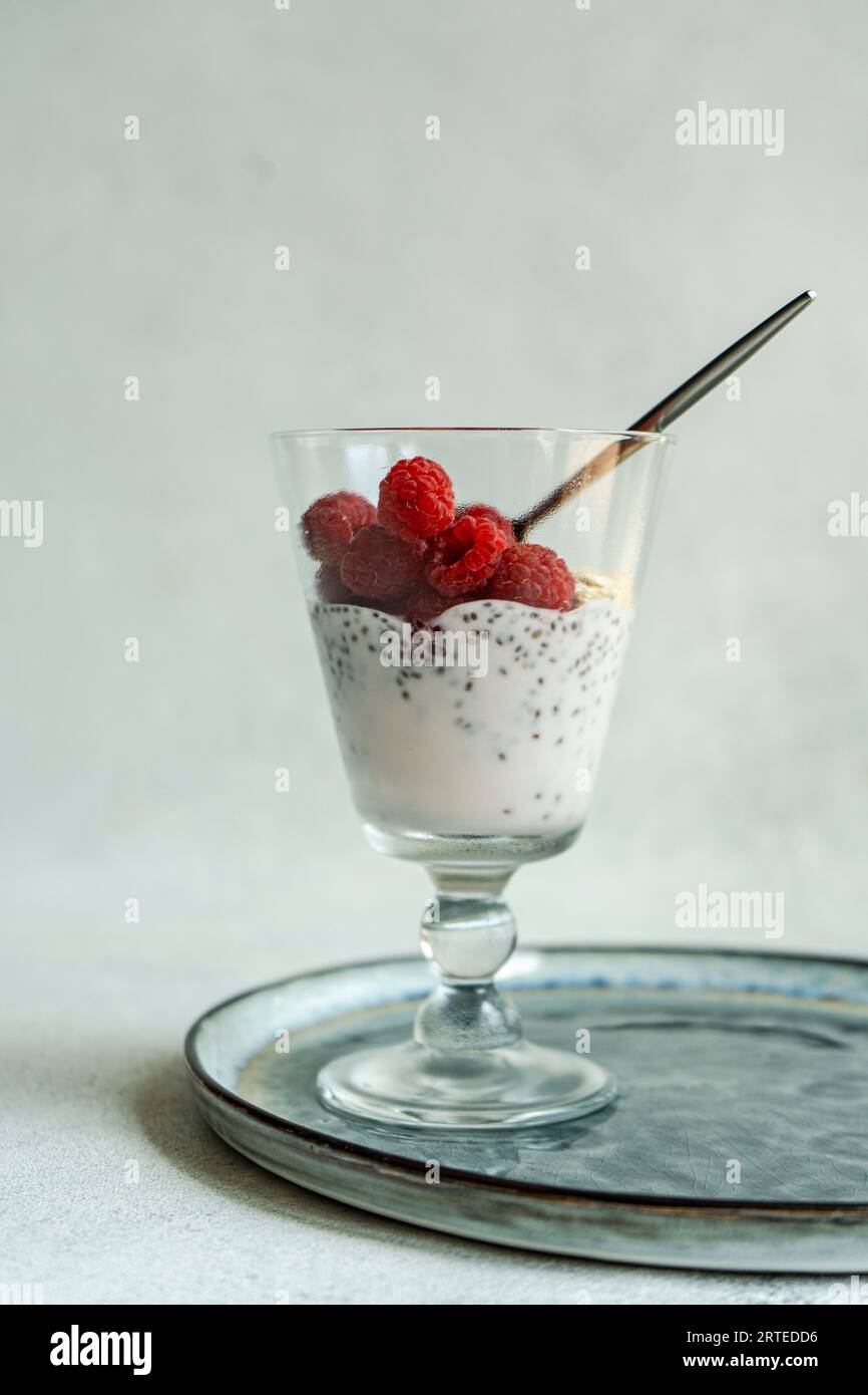 Chia pudding with fresh organic raspberries Stock Photo - Alamy