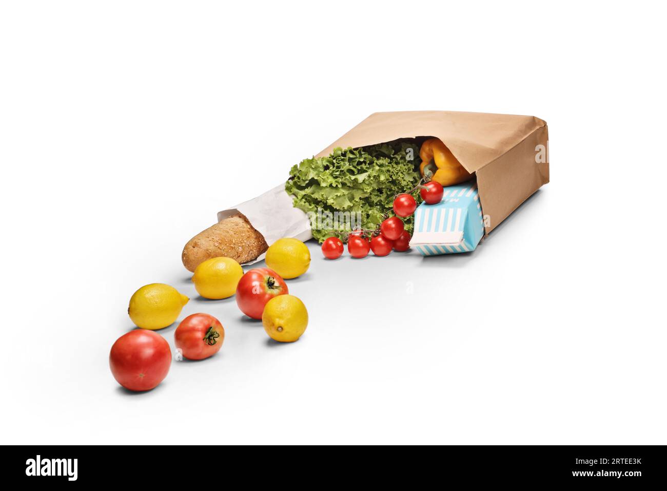 Grocery bag on the ground with products falling isolated on white ...