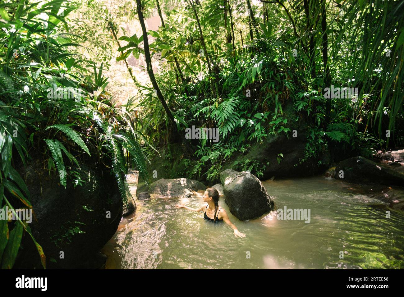 Beautiful woman enjoying jungle hot hi-res stock photography and images ...