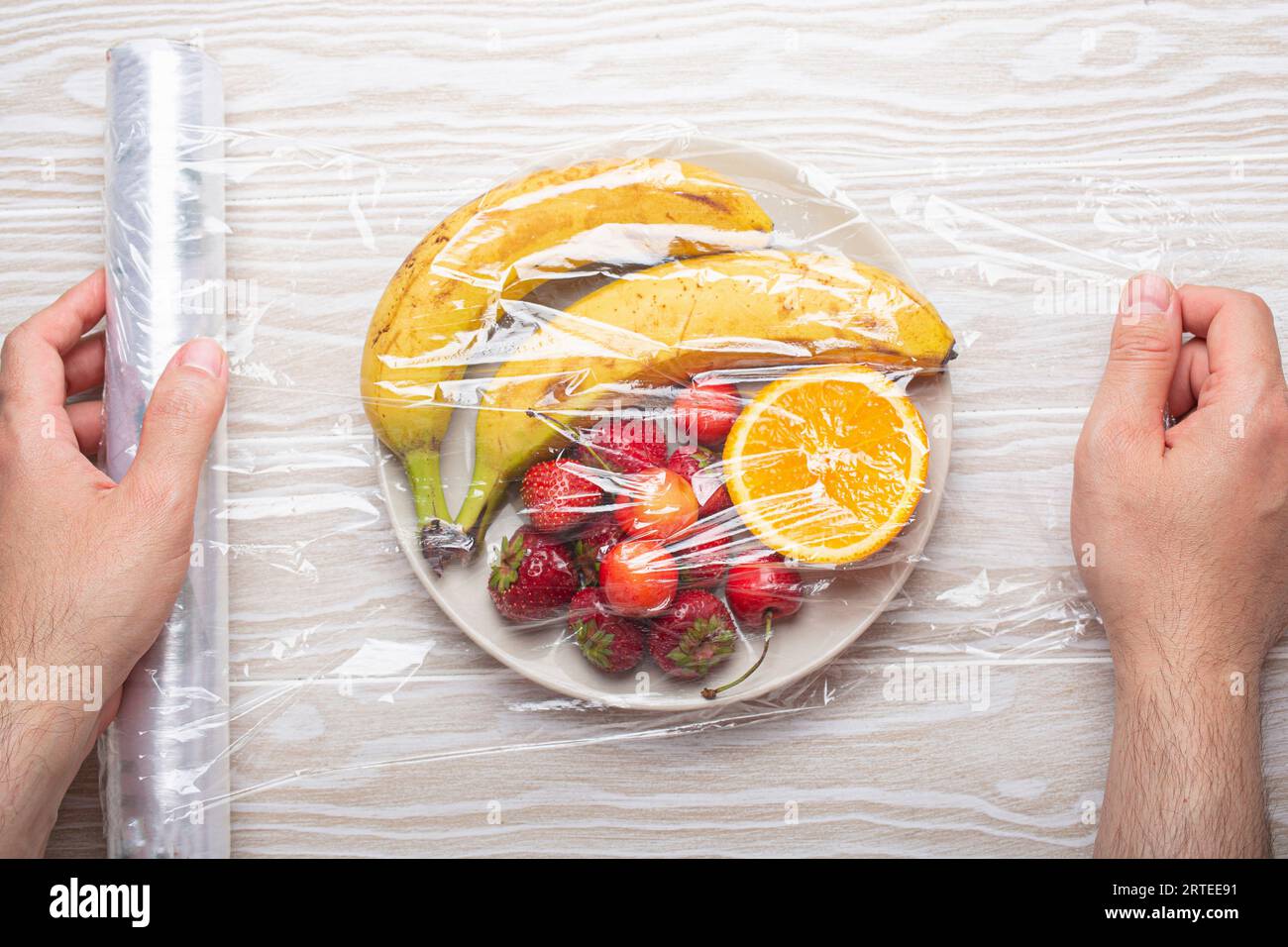 Fruit under plastic wrap hi-res stock photography and images - Alamy