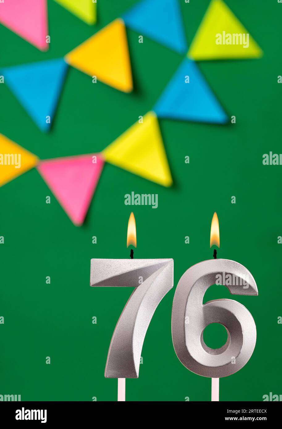 Vertical birthday card with number 76 candle - Green background with ...