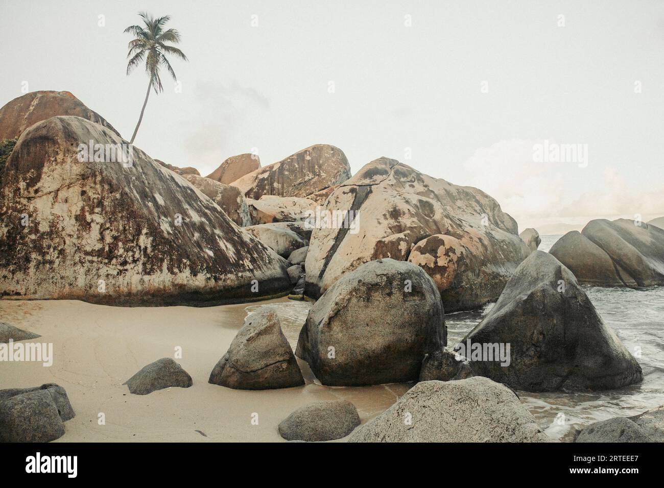 Close-up view of the large, boulders on the seaside shores of The Baths ...