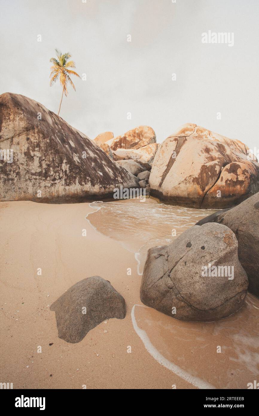 Close-up view of the large, boulders on the seaside shores of The Baths ...