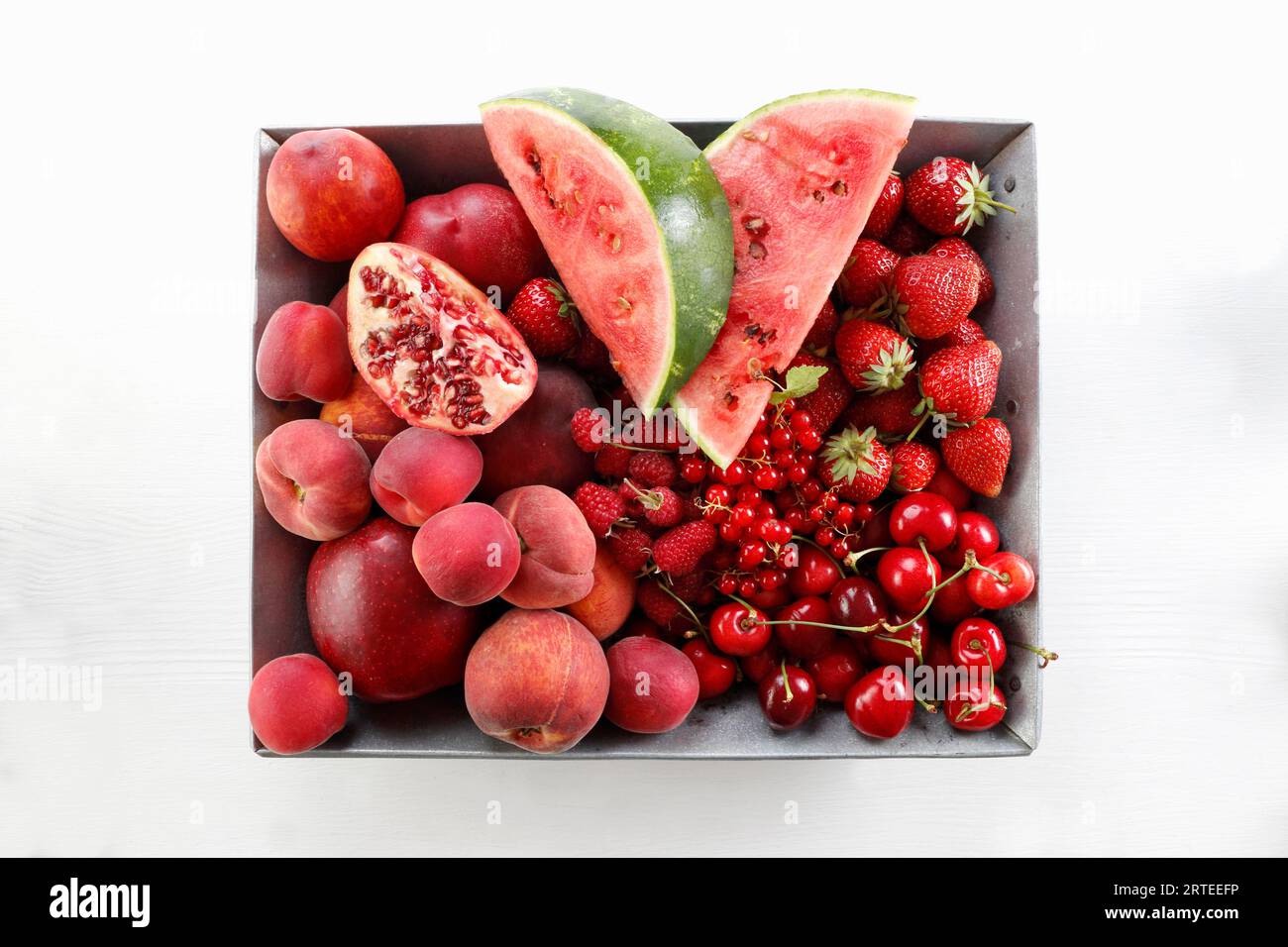 Assorted red fruits Stock Photo - Alamy