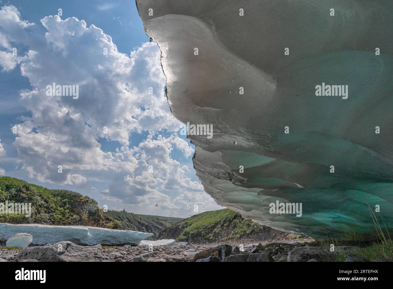 Scenic view under an overhang of the late season ice formation known as ...