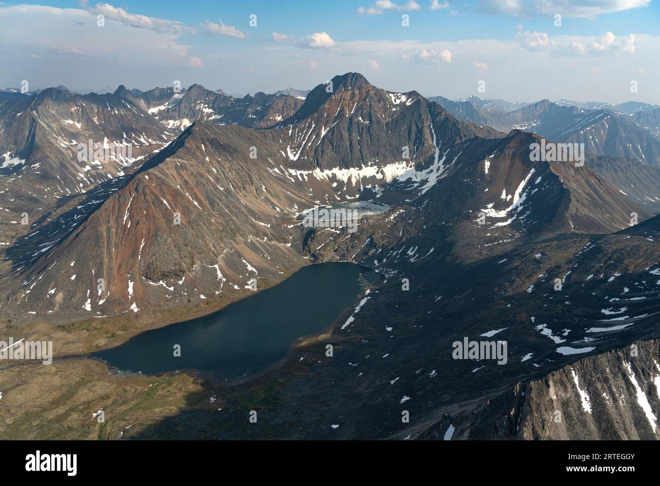 Aerial views of the Tombstone Range and Syenite Lakes along the ...