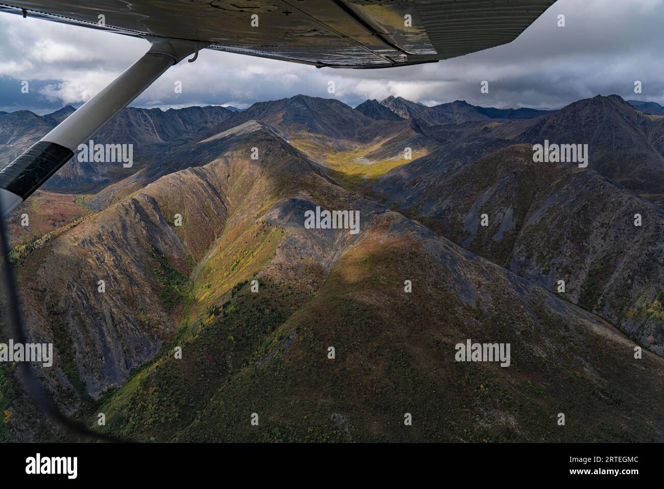 Aerial view of mountains and tundra in autumn colours in Tombstone ...
