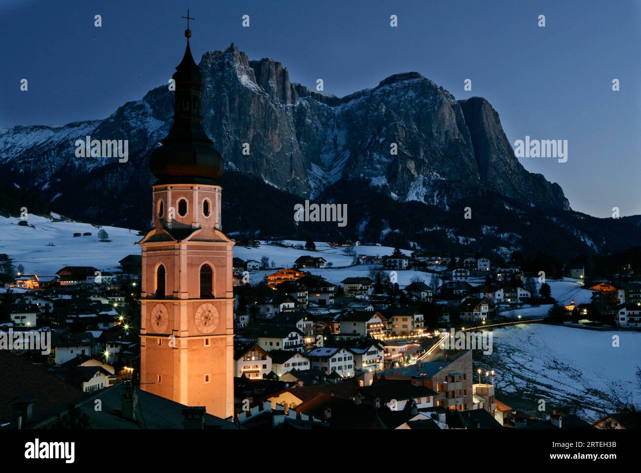 Twilight falls on the village of Castelrotto; Castelrotto, Italy Stock ...