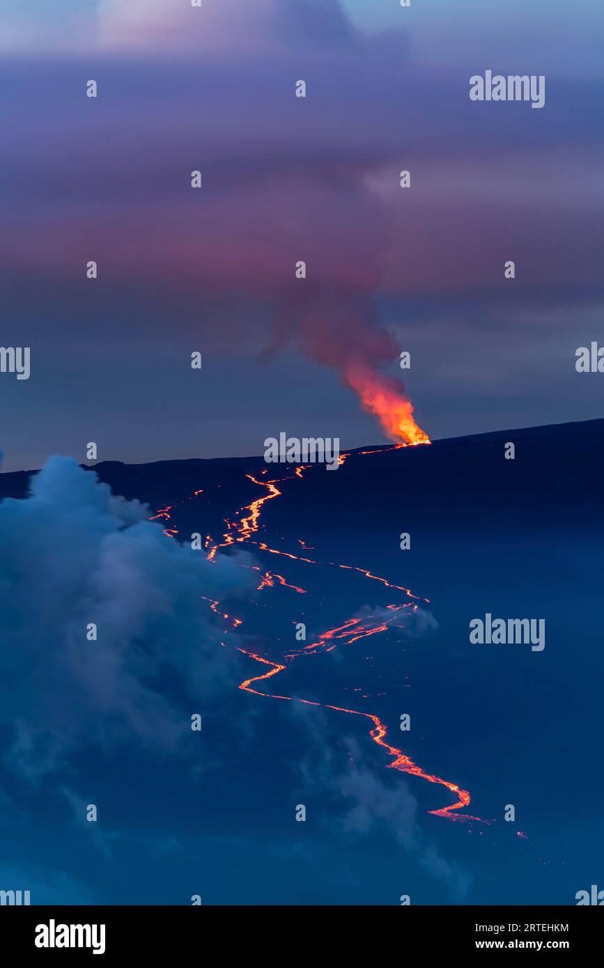Spectacular view at twilight of the 2022 eruption and lava flow of Mauna Loa Volcano (Moku ...