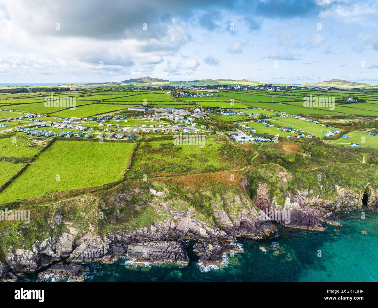 Cliffs over Caerfai Beach and Bay from a drone, St Davids ...
