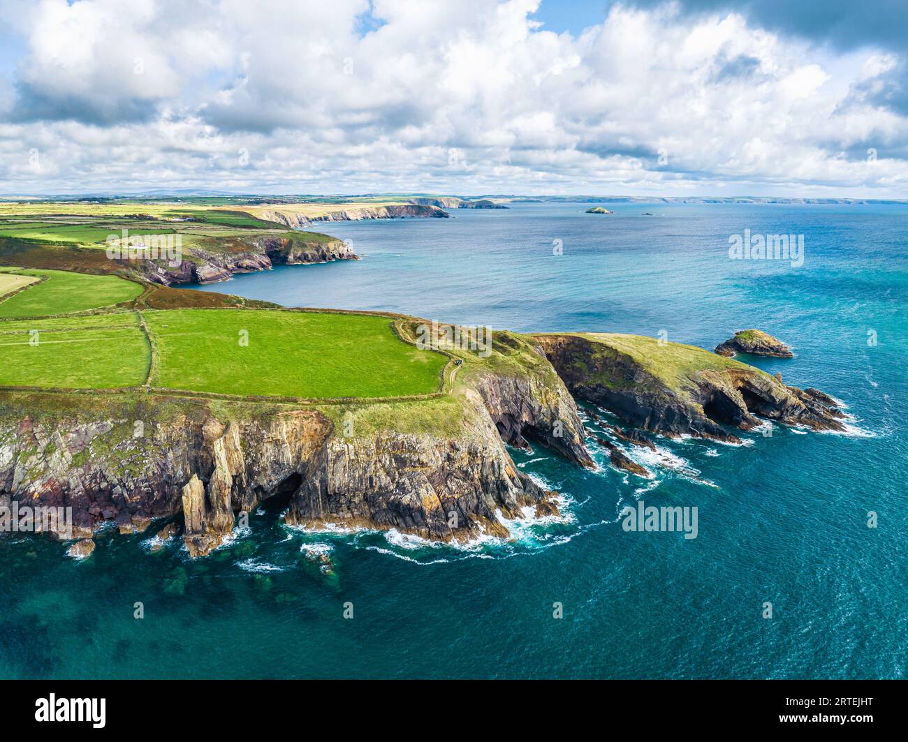 Cliffs over Caerfai Beach and Bay from a drone, St Davids ...