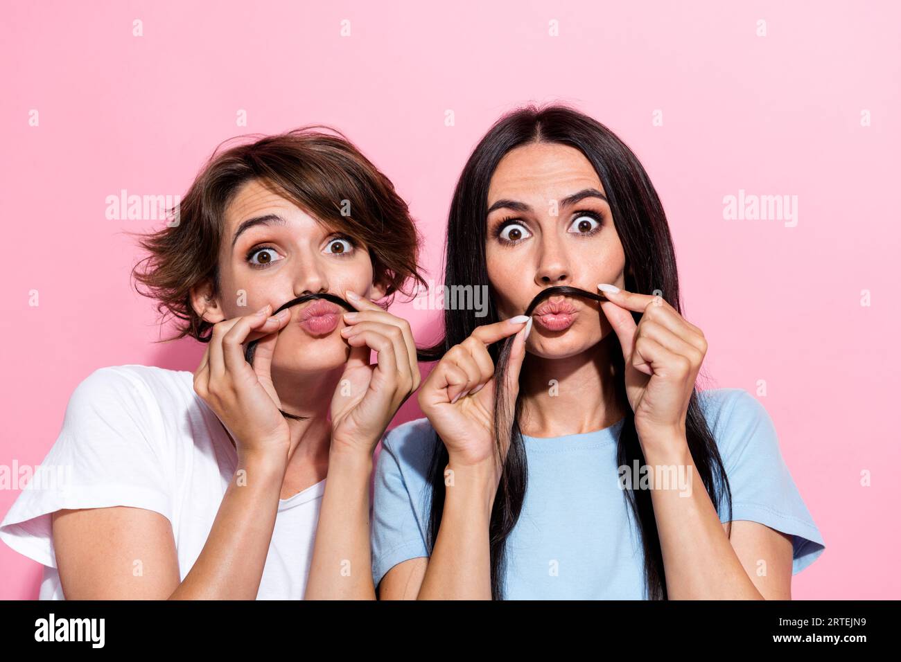 Photo of two funky girls best friends weekend free time mustache made ...