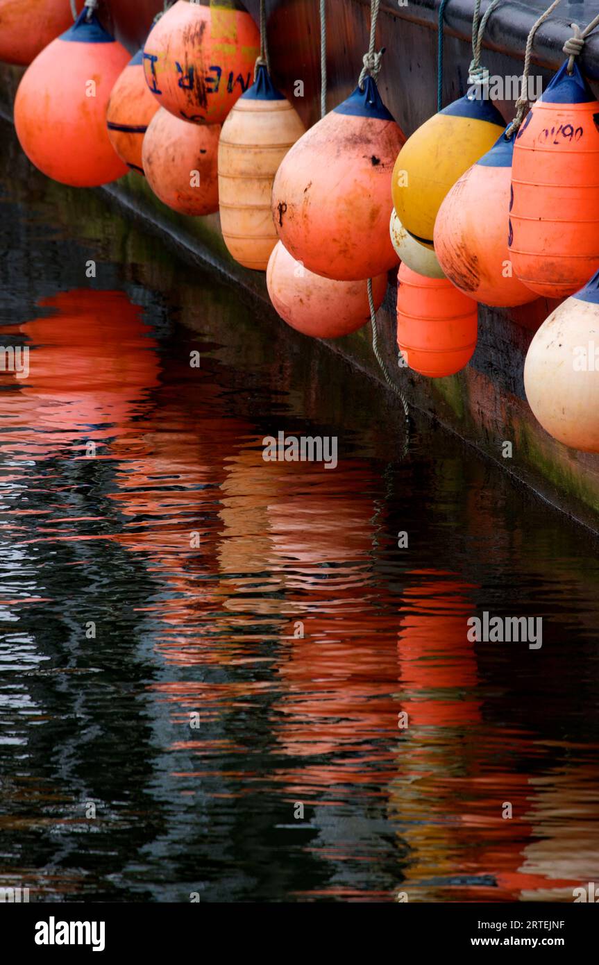 Net and trap markers hanging off a fishing boat; Inside Passage, Alaska ...