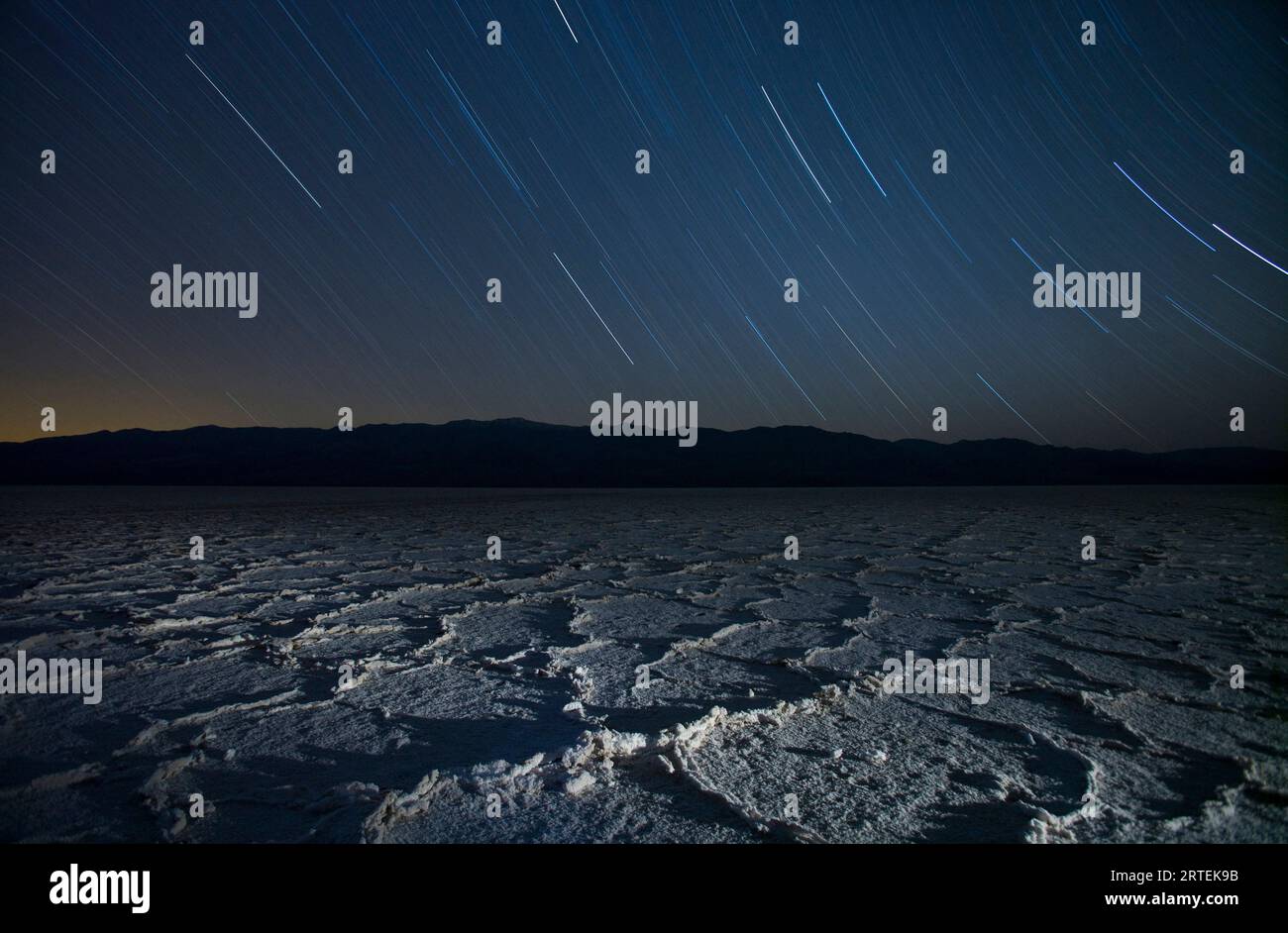 Star trails above the salt flats of Badwater Basin in Death Valley ...