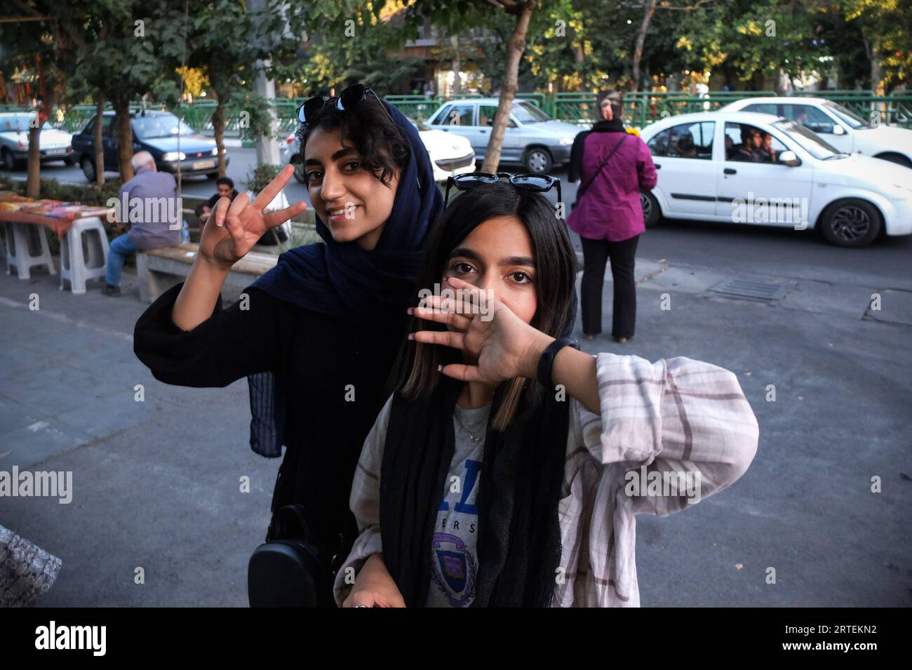 Tehran, Iran. 12th Sep, 2023. Two Iranian young women pose at Enghelab ...