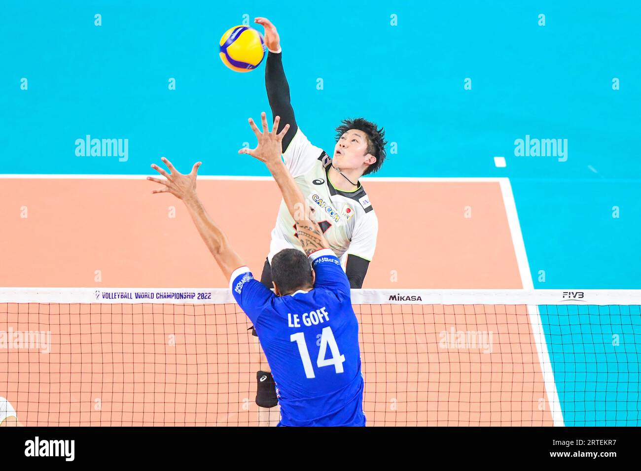 Yuki Ishikawa (Japan) scoring over Nicolas Le Goff (France). Volleyball ...