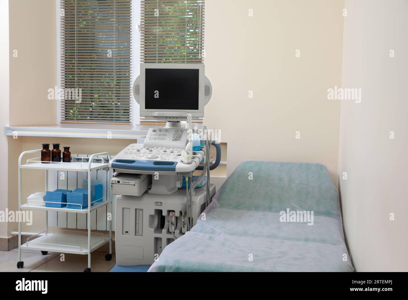 Ultrasound machine, medical trolley and examination table in hospital ...