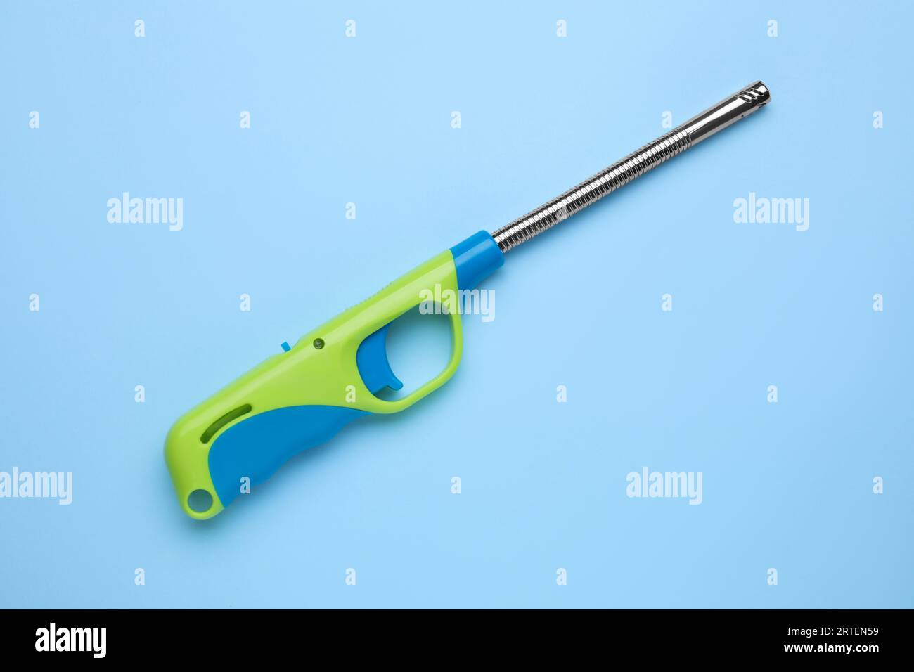 One gas lighter on light blue background, top view Stock Photo - Alamy