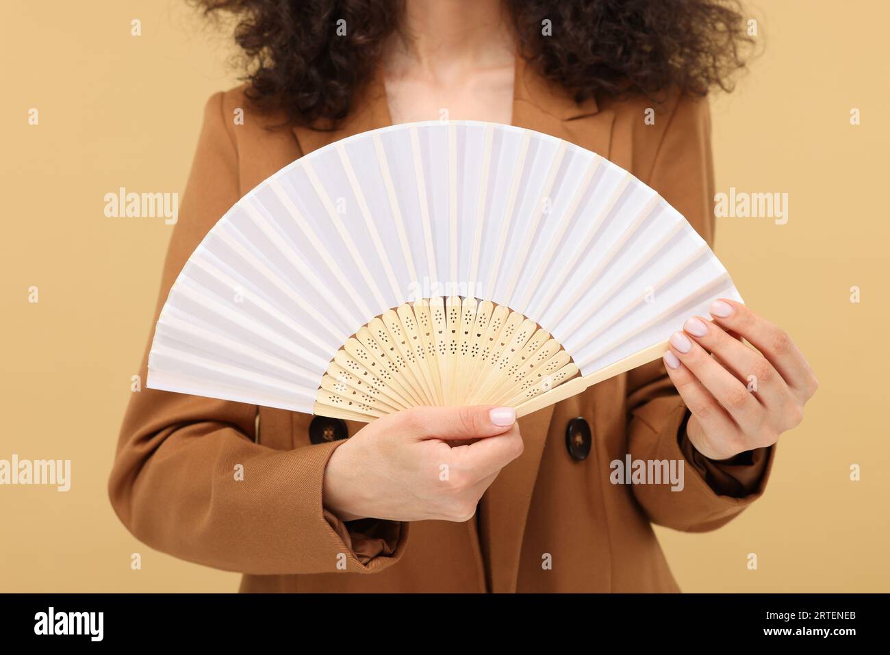 Woman fanning hands hi-res stock photography and images - Alamy