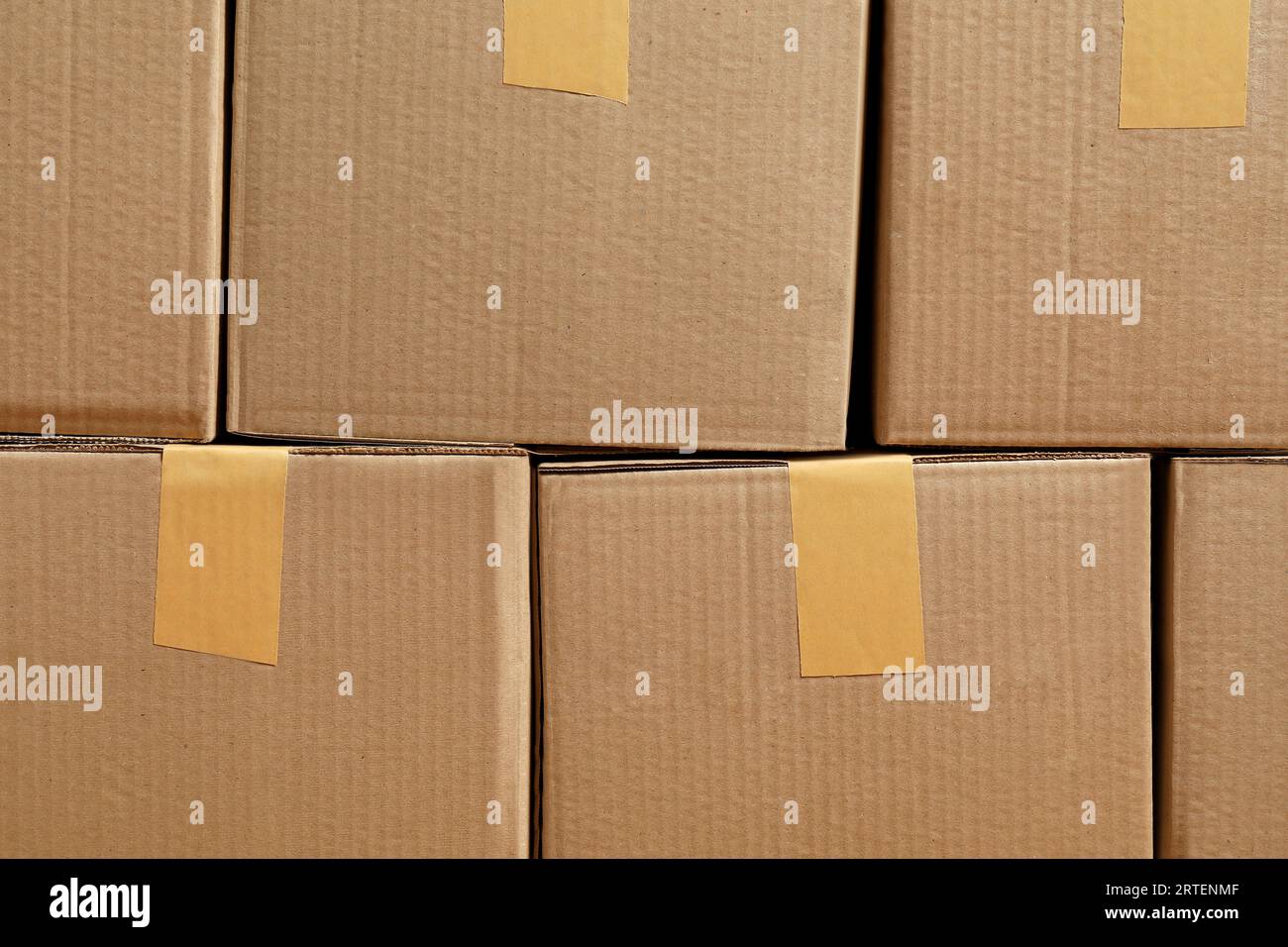 Stack of many cardboard boxes as background. Packaging goods Stock ...